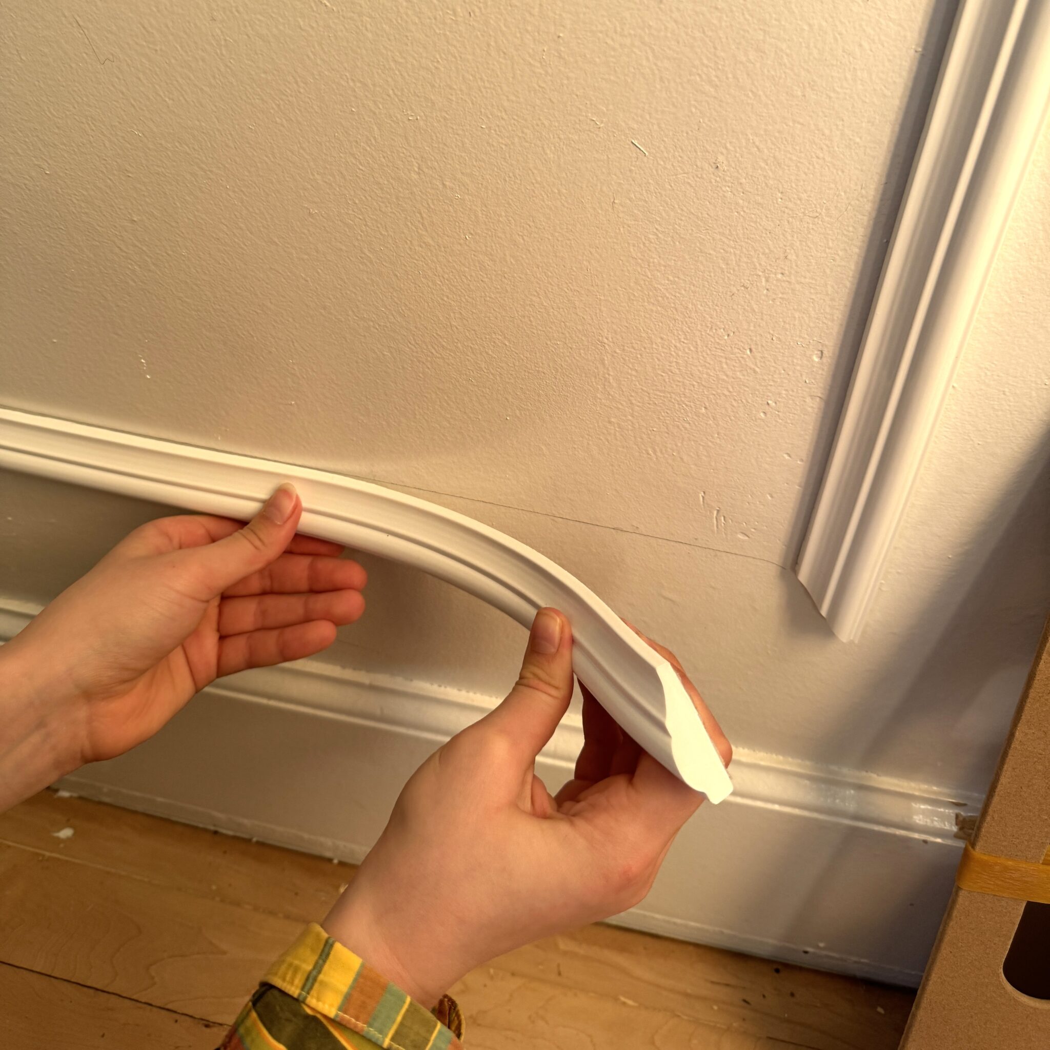 Install picture frame molding with flexible trim